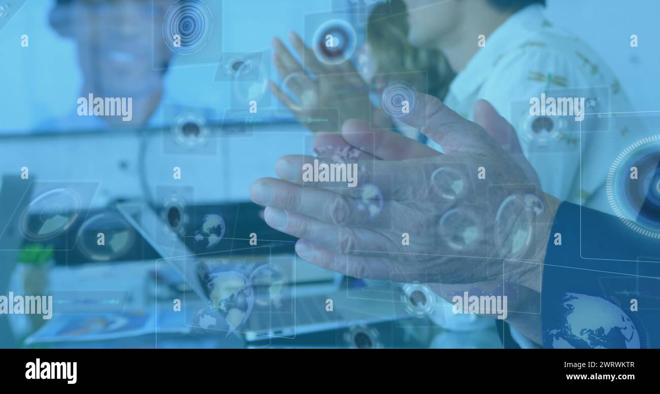 Image of diverse data on digital screen over businesspeople clapping ...