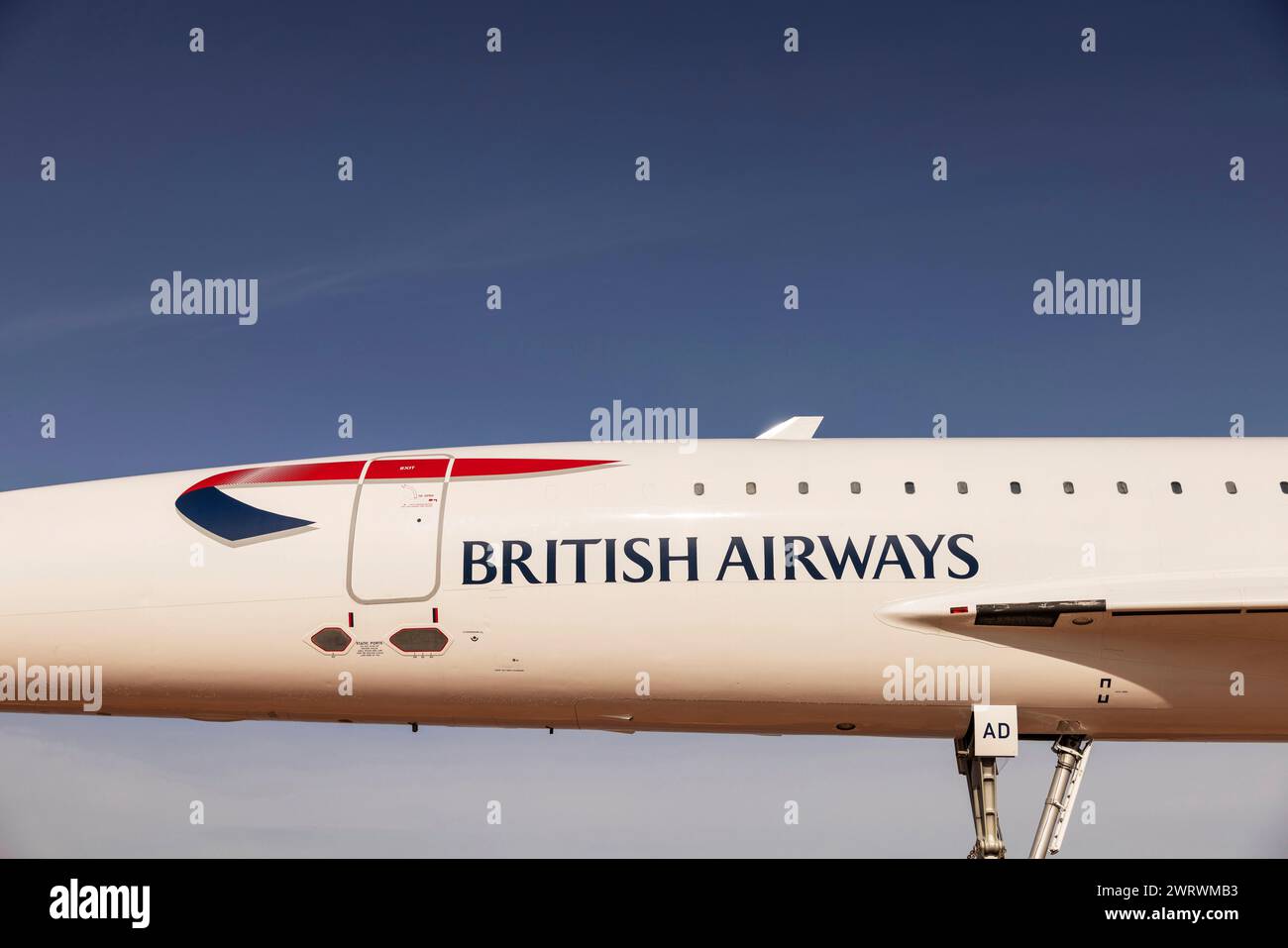 A retired British Airways Concorde supersonic aircraft is docked next ...