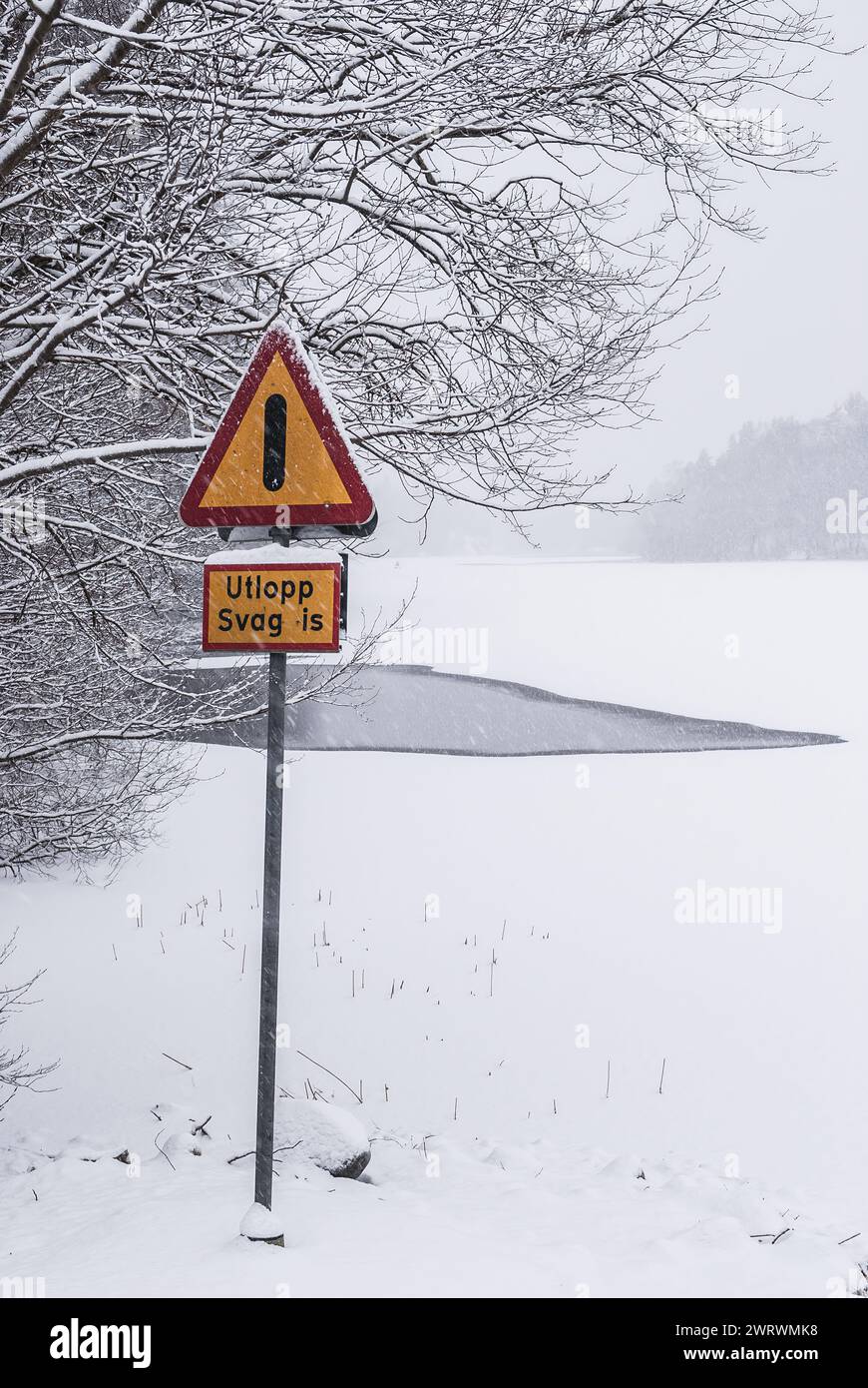 A cautionary triangular sign with an exclamation mark stands out ...