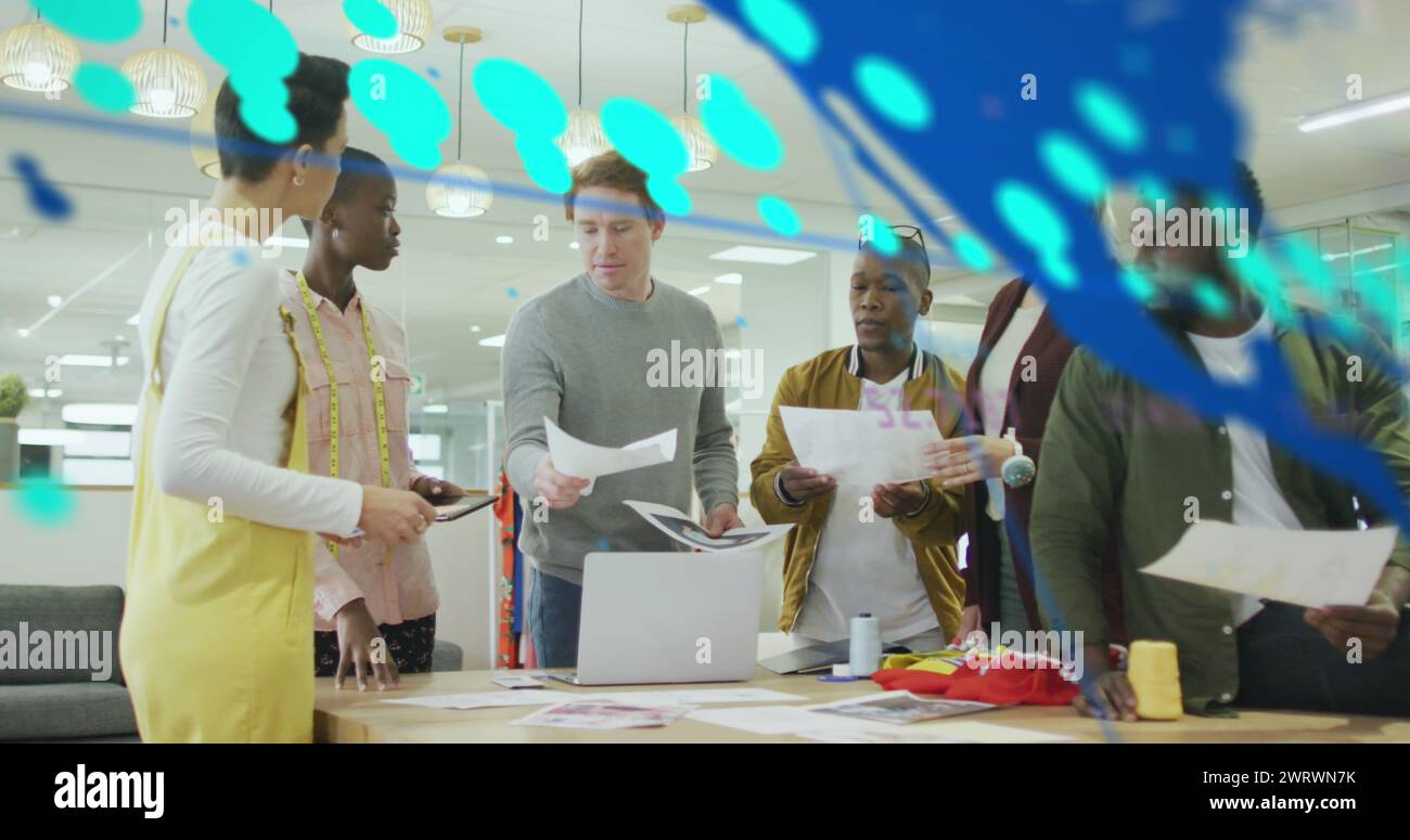 Image of graphs, changing numbers and map over diverse coworkers ...