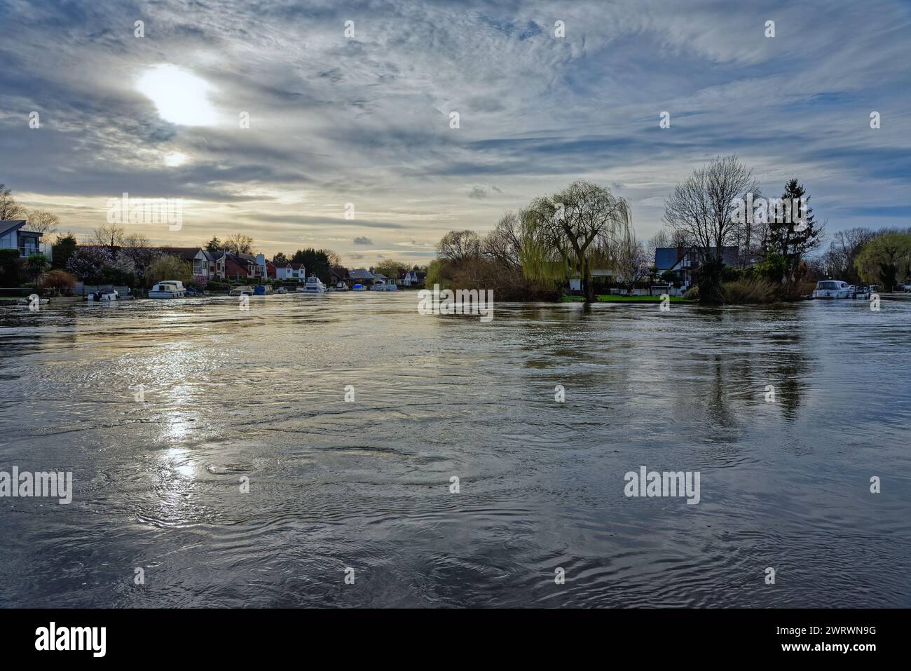 The River Thames in full flood at Shepperton on a winters evening ...