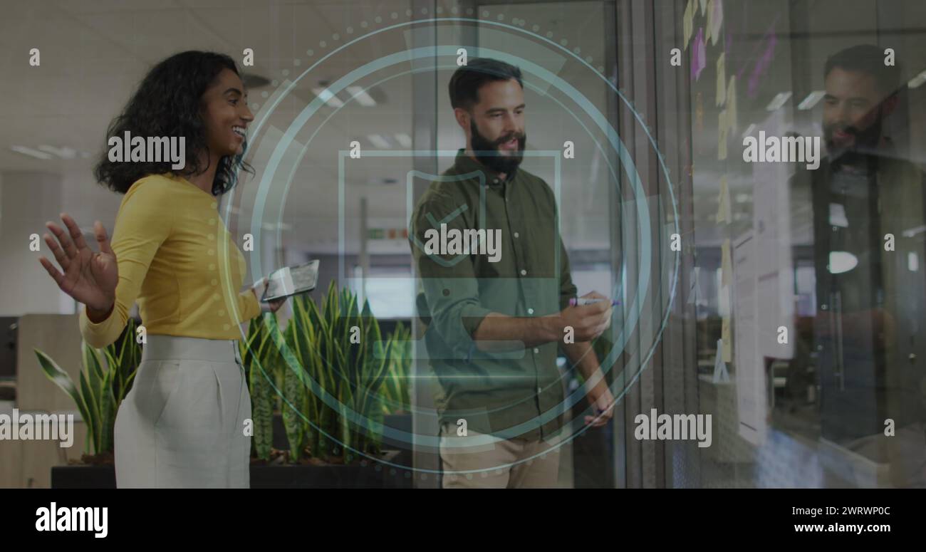 Image of scope scanning with cyber security text over diverse business ...