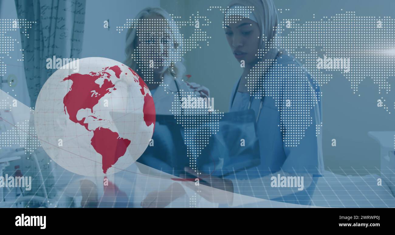 Image of globe and world map over diverse doctors at hospital Stock ...