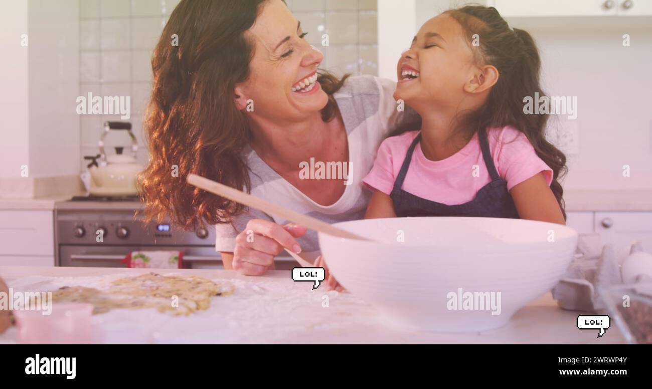 Image of lol texts over happy caucasian mother with daughter baking Stock Photo - Alamy