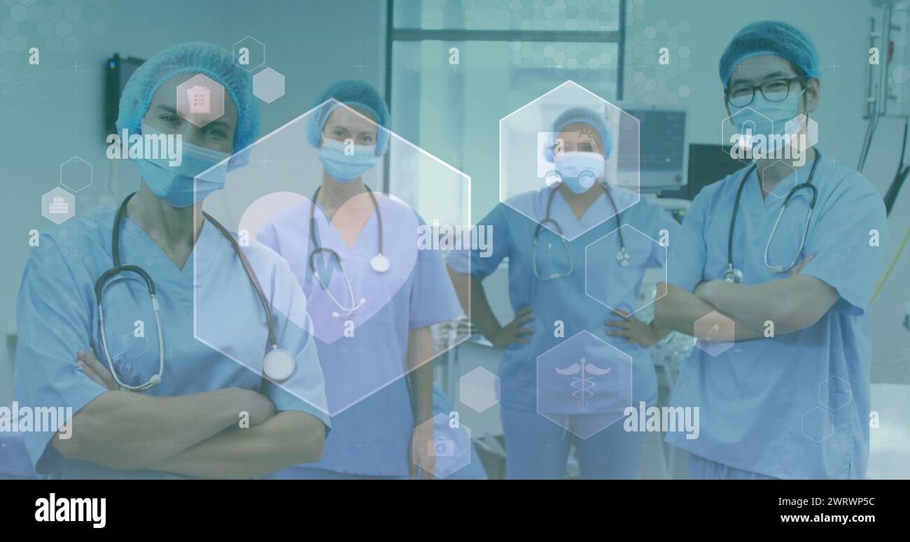 Image of medical icons over diverse doctors wearing face masks Stock ...