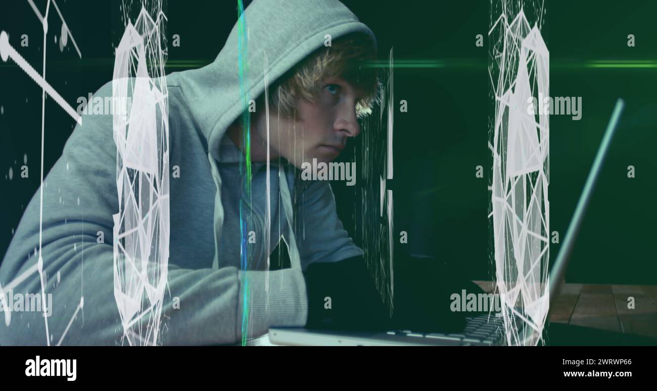 Hacker in hoodie uses laptop with floating shapes on green background ...