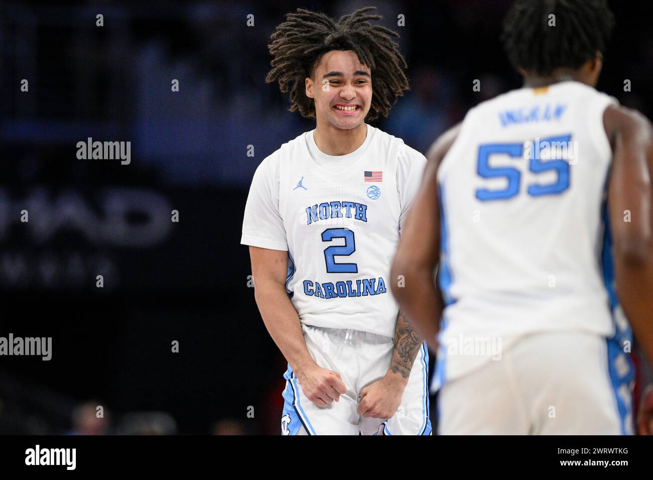 North Carolina guard Elliot Cadeau (2) celebrates during the first half ...