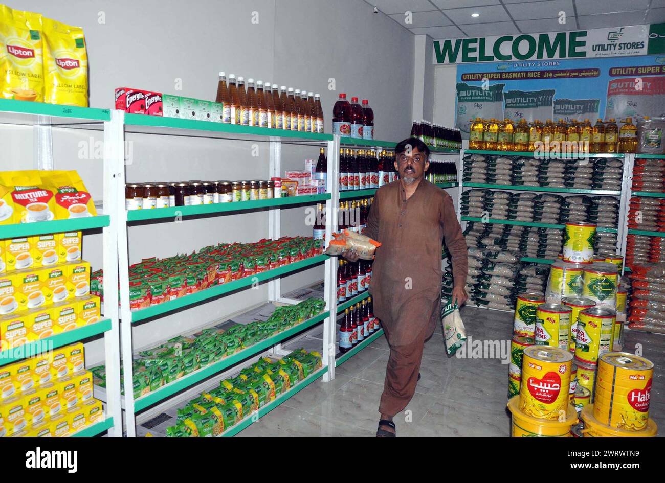 People are buying groceries from utility store set up- with regard to ...