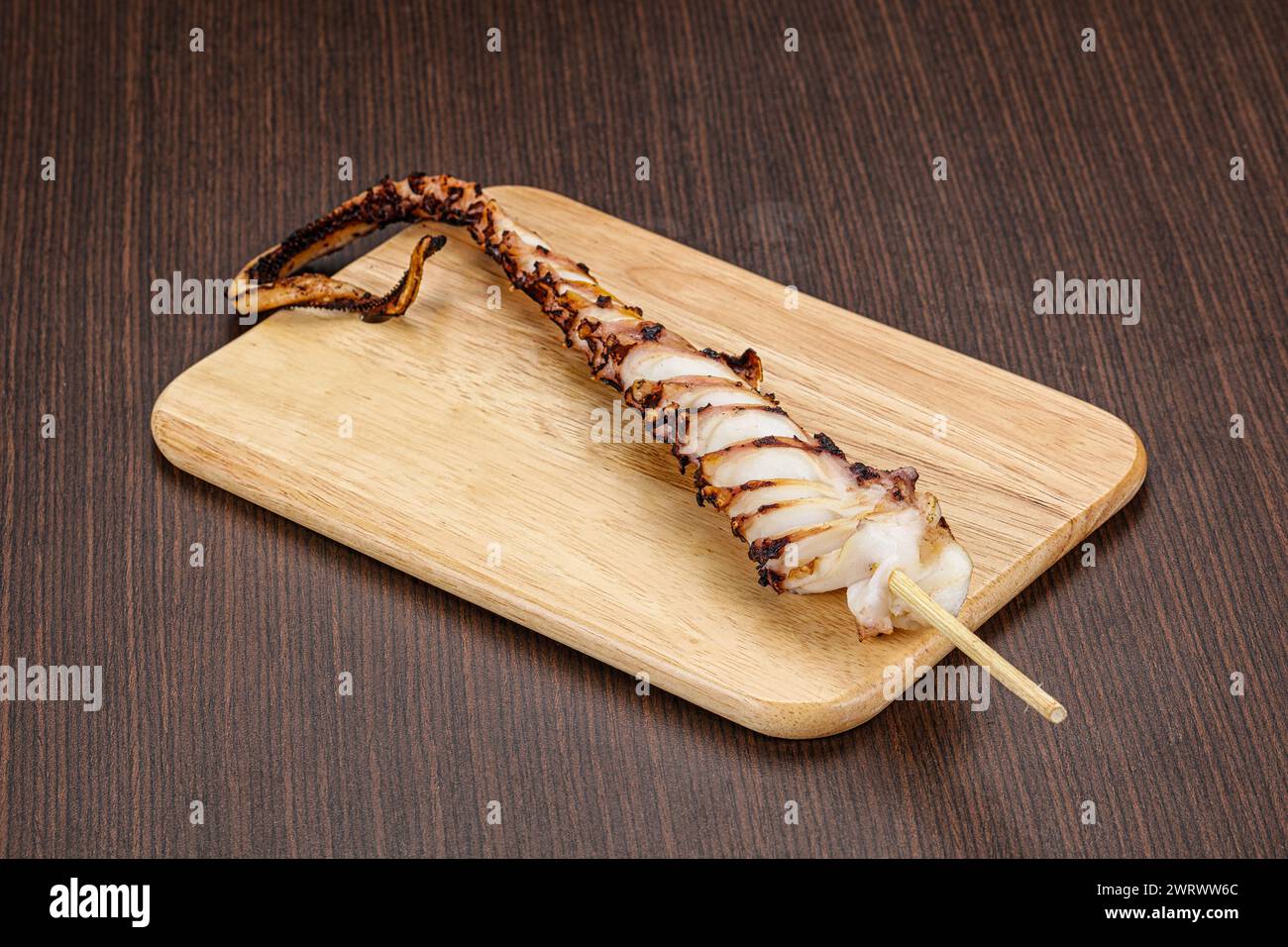 Delicous tasty Grilled octopus tentacle snack Stock Photo - Alamy