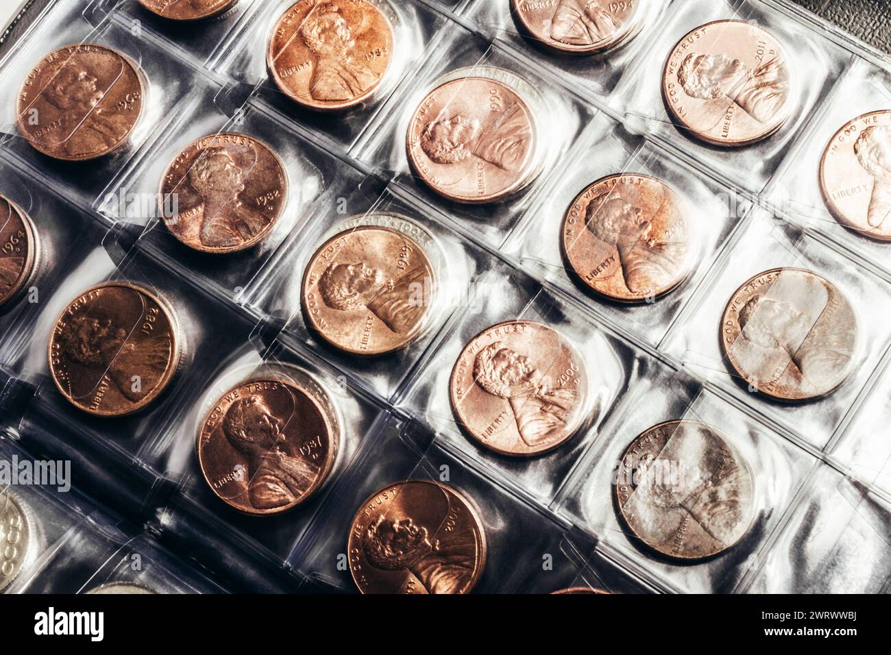 Photo of US president Lincoln cent coins collection in a clear plastic ...