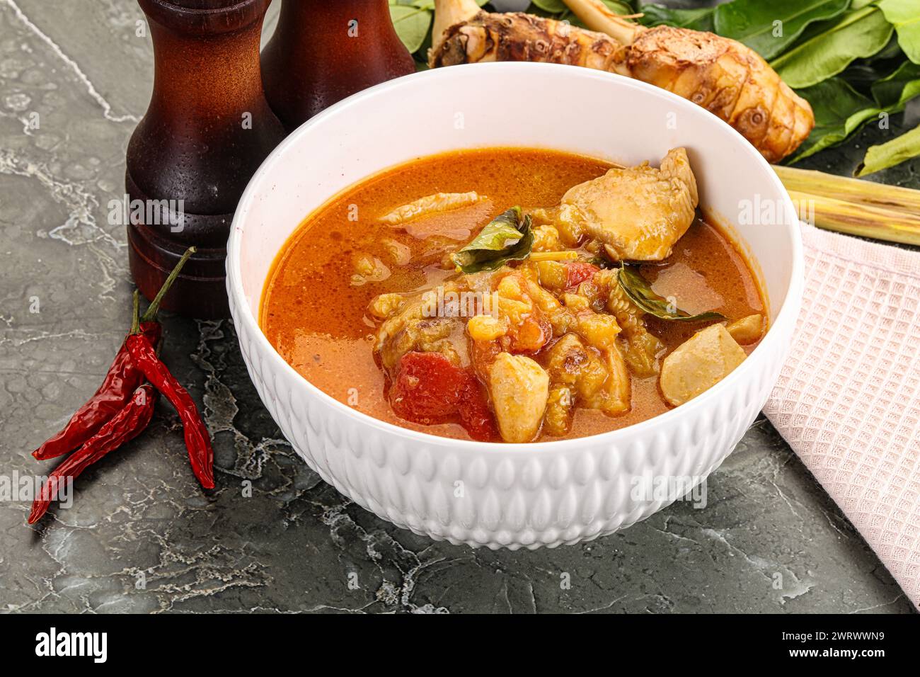 Thai traditional Tom Yum spicy soup with chicken Stock Photo - Alamy