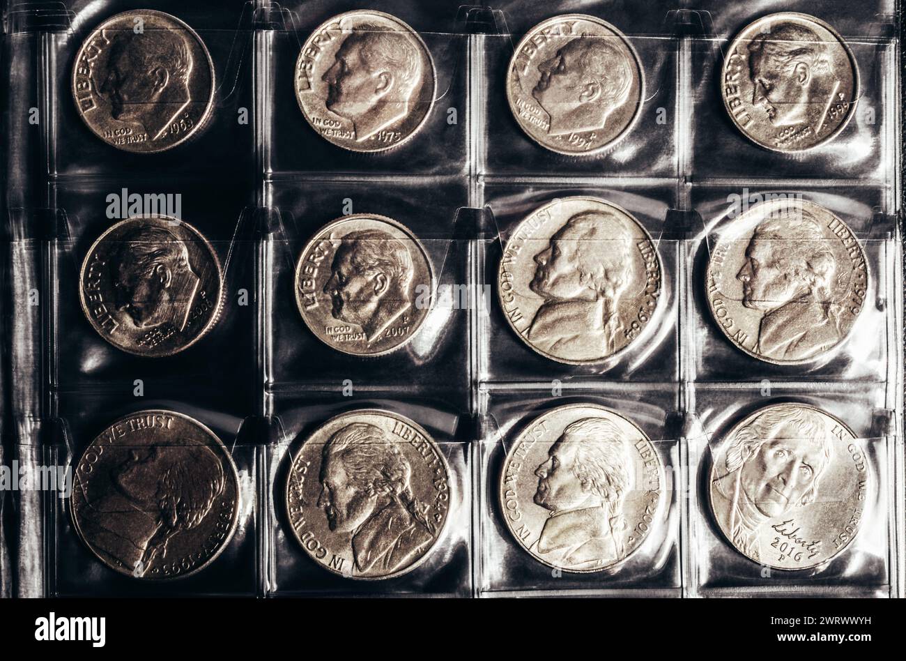 Photo of USA dime and 5 cent coins coins collection in a clear plastic ...