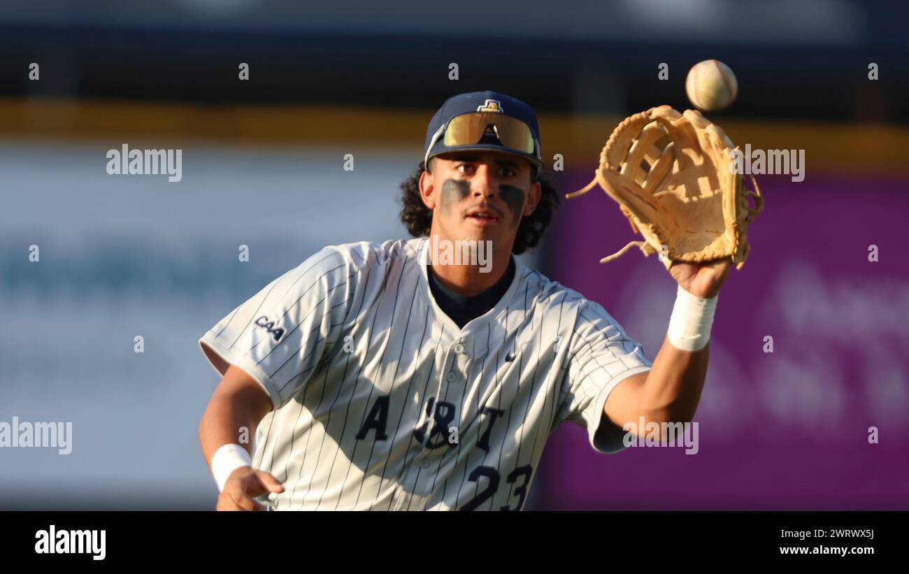 North Carolina A&T infielder Isaiah Monge (23) warms up before an NCAA ...