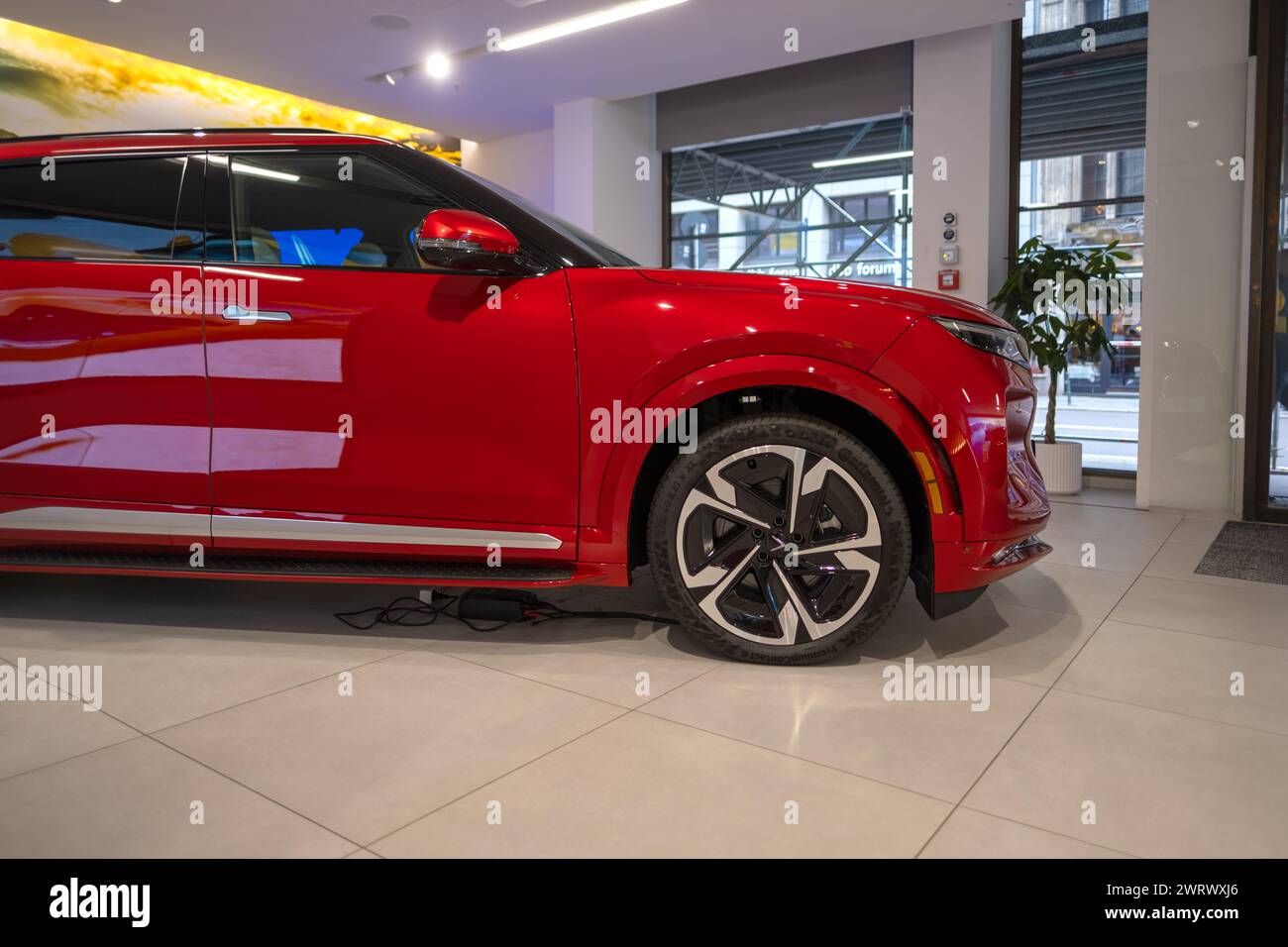 new red Vinfast vf 9 electric SUV in Studio, advanced technologies in ...