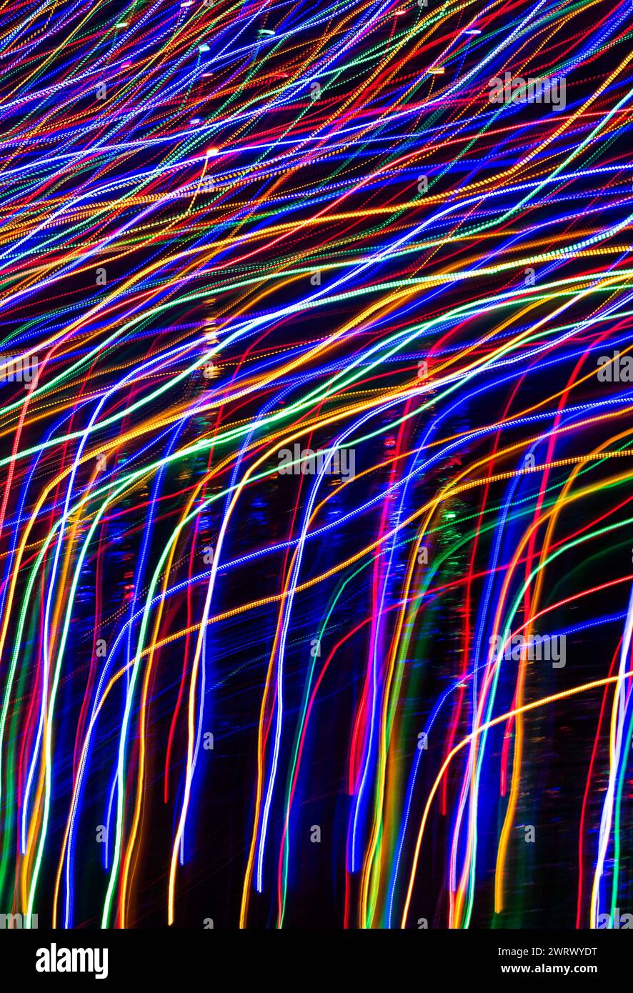 Coloured lights out of focus on a dark evening, including shots with ...