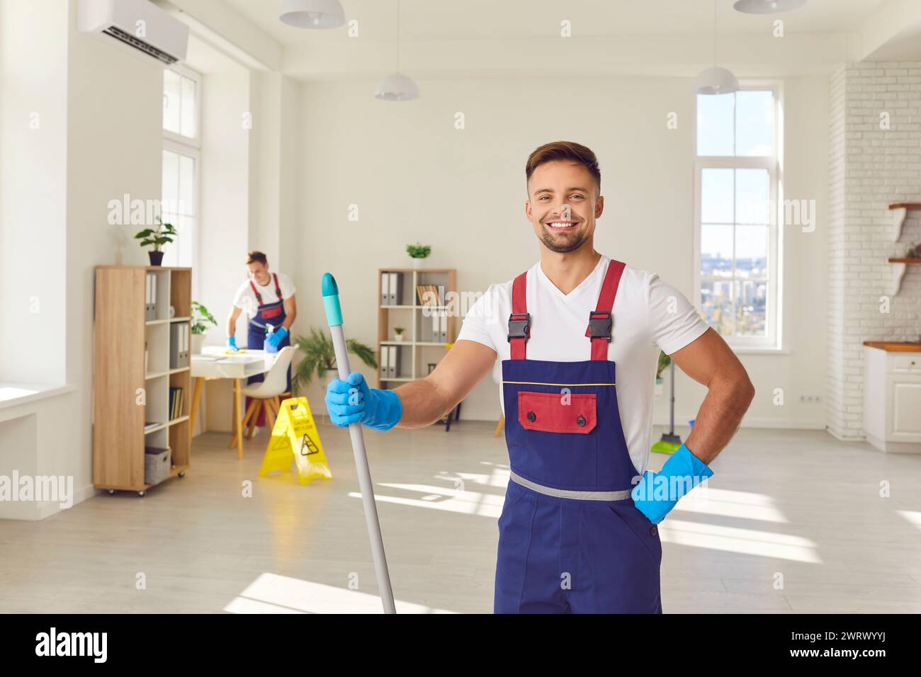 Janitor mopping office hi-res stock photography and images - Alamy