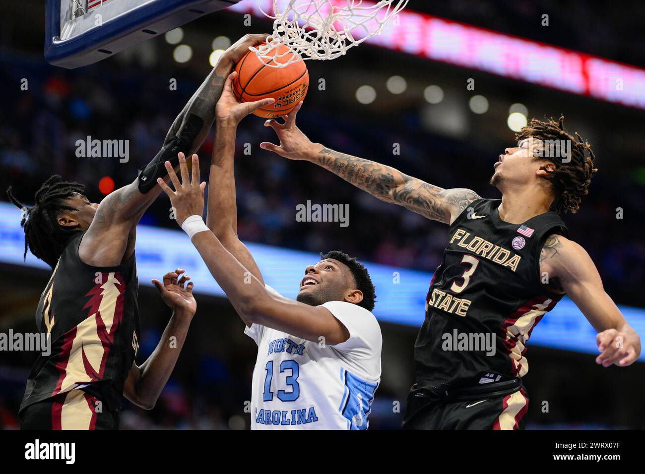 Florida State forwards Jamir Watkins, left, and Cam Corhen combine to ...