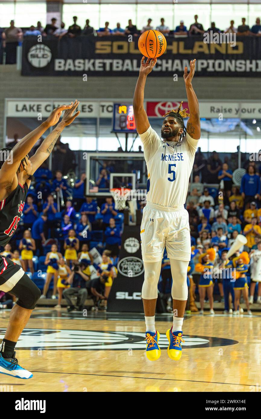 McNeese State's Antavion Collum shoots a 3-pointer against Nicholls ...