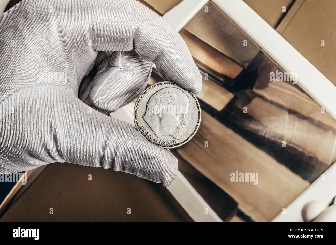 Photo of a person's male hand in white gloves holding a soviet 1970 ...