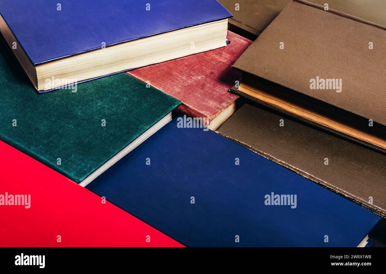 Photo of old antique books laying on table surface Stock Photo - Alamy