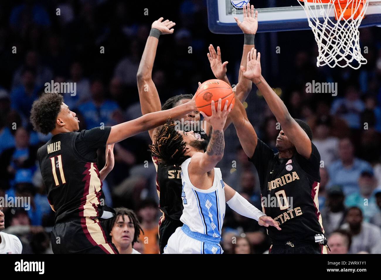 Florida State forward Baba Miller, left, forward Jaylan Gainey, back ...