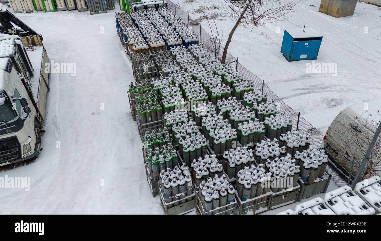 Drone photography of gas storage tanks in a open air warehouse during ...