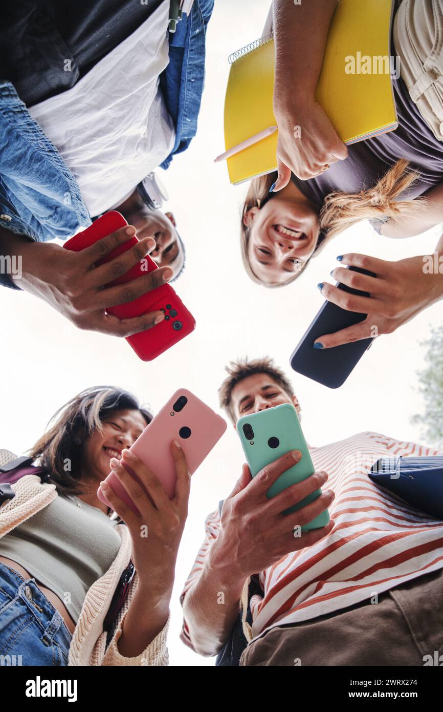 Group of hands holding cell phones hi-res stock photography and images ...