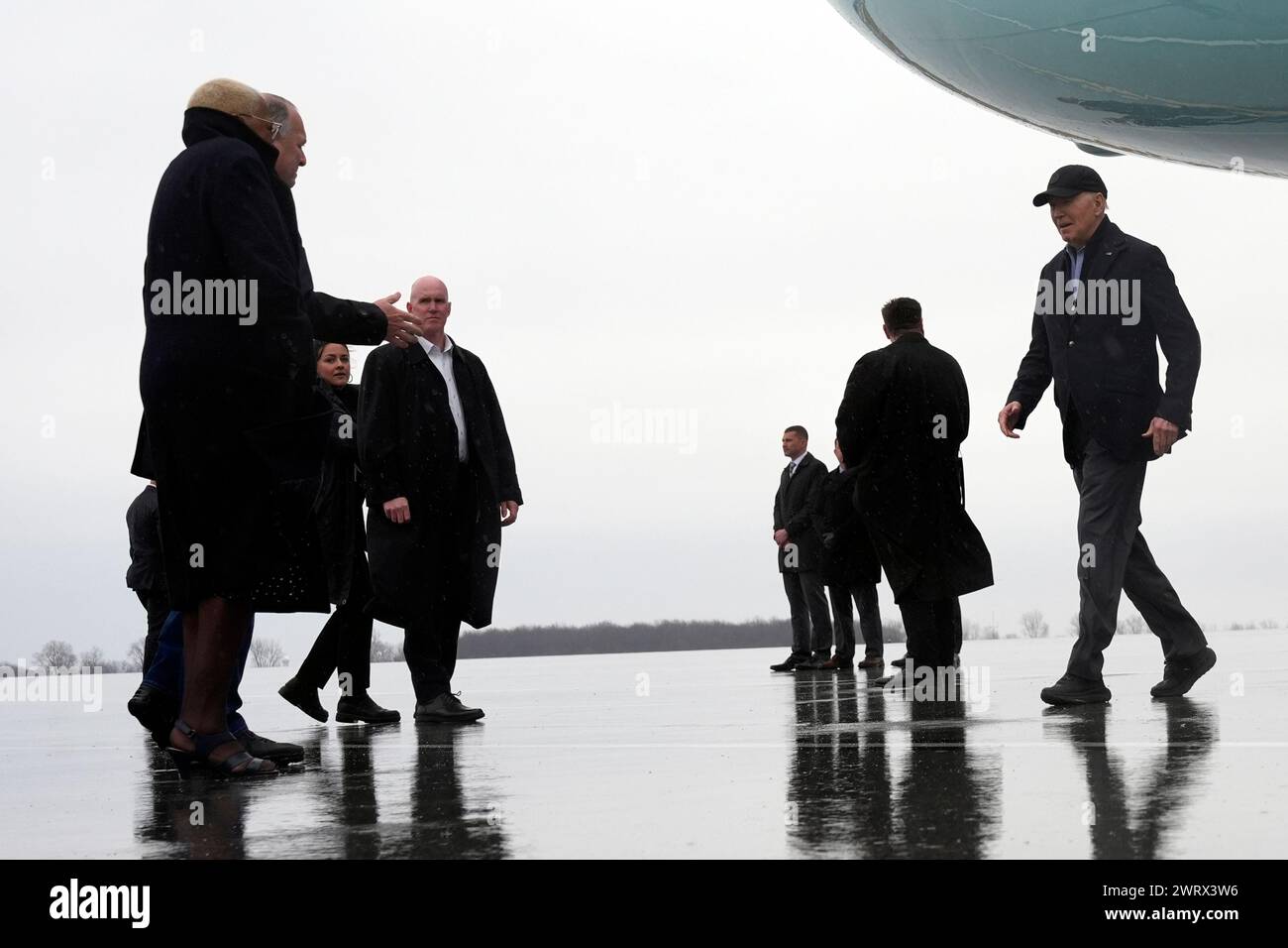 President Joe Biden arrives on Air Force One, Thursday, March 14, 2024 ...