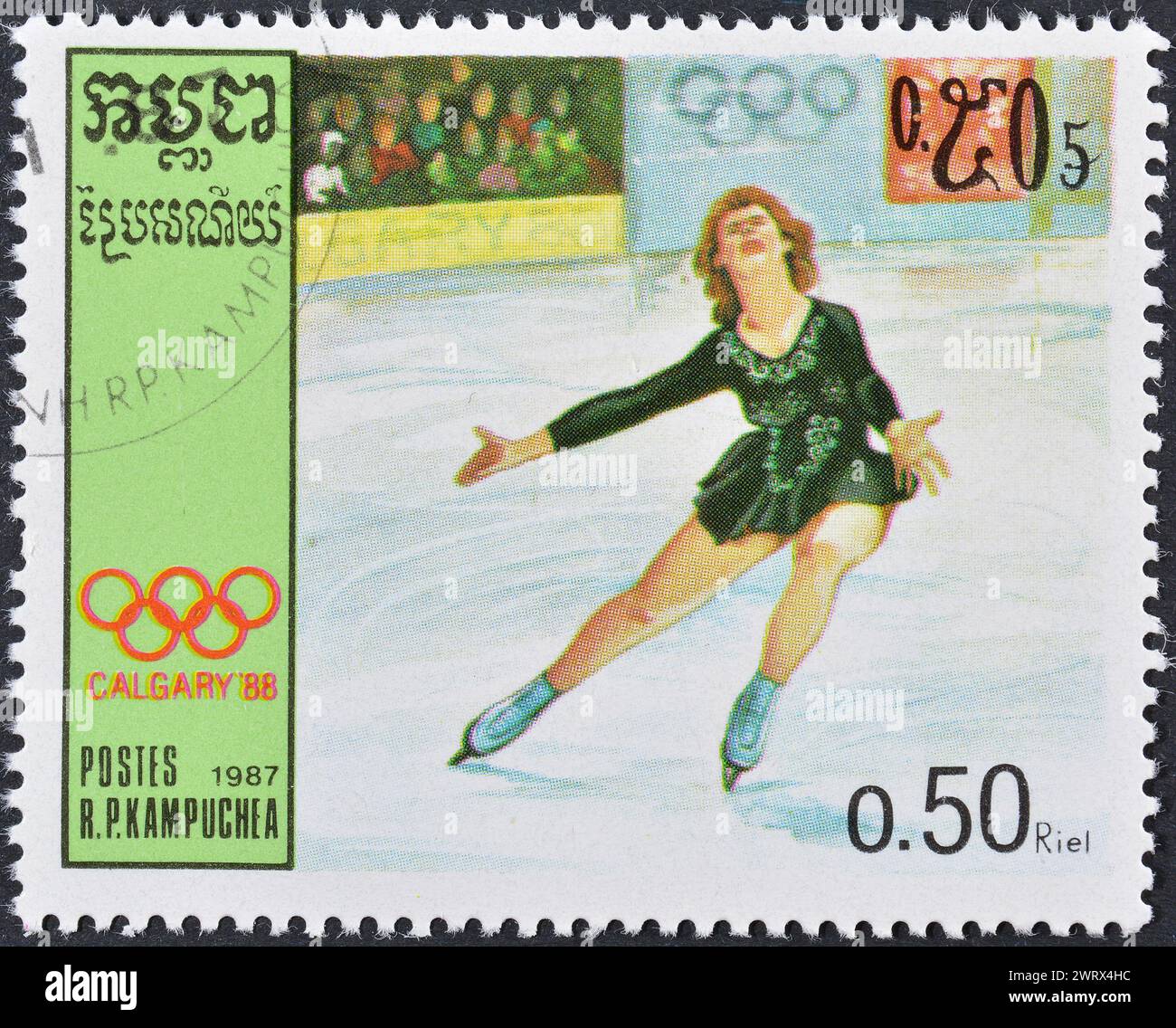 Cancelled postage stamp printed by Cambodia, that shows Figure skating ...