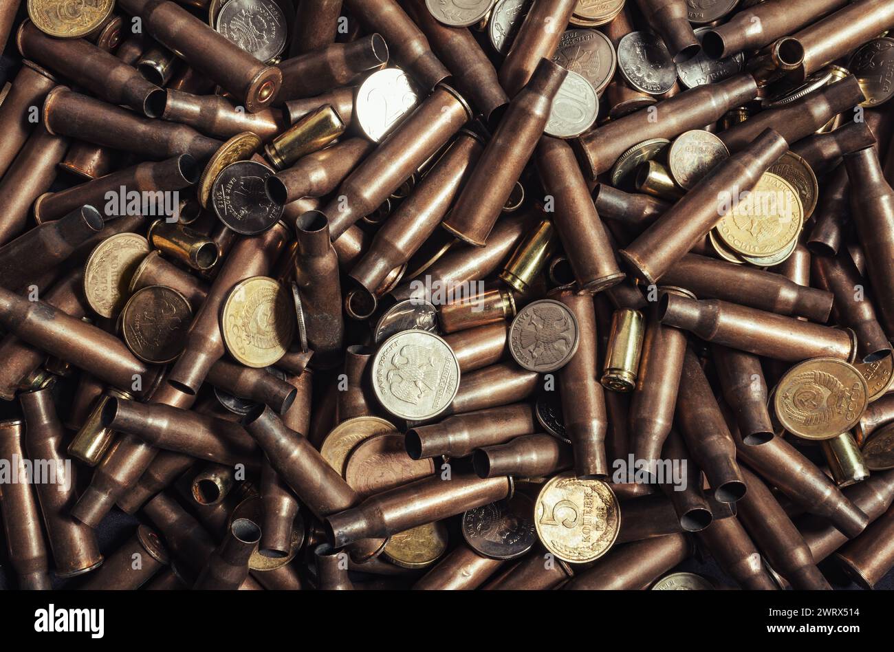 Photo of russian coins laying on bullet shells Stock Photo - Alamy