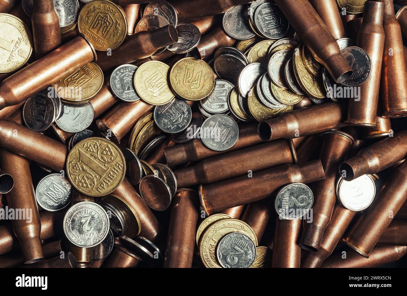 Photo of ukrainian coins laying on bullet shells Stock Photo - Alamy