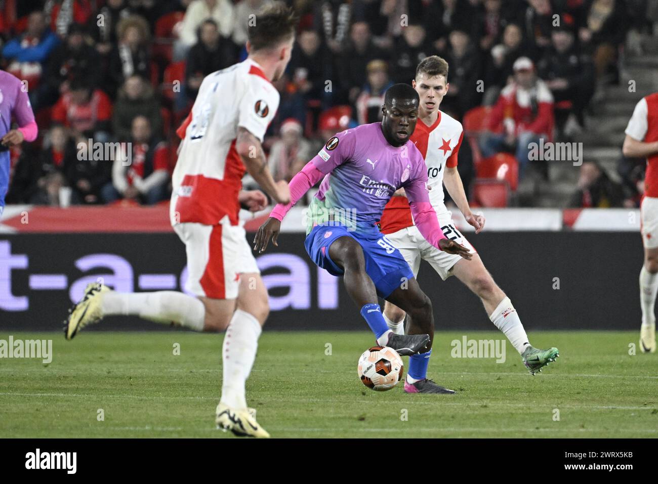 Prague, Czech Republic. 14th Mar, 2024. Yunus Musah of AC Milan, left ...