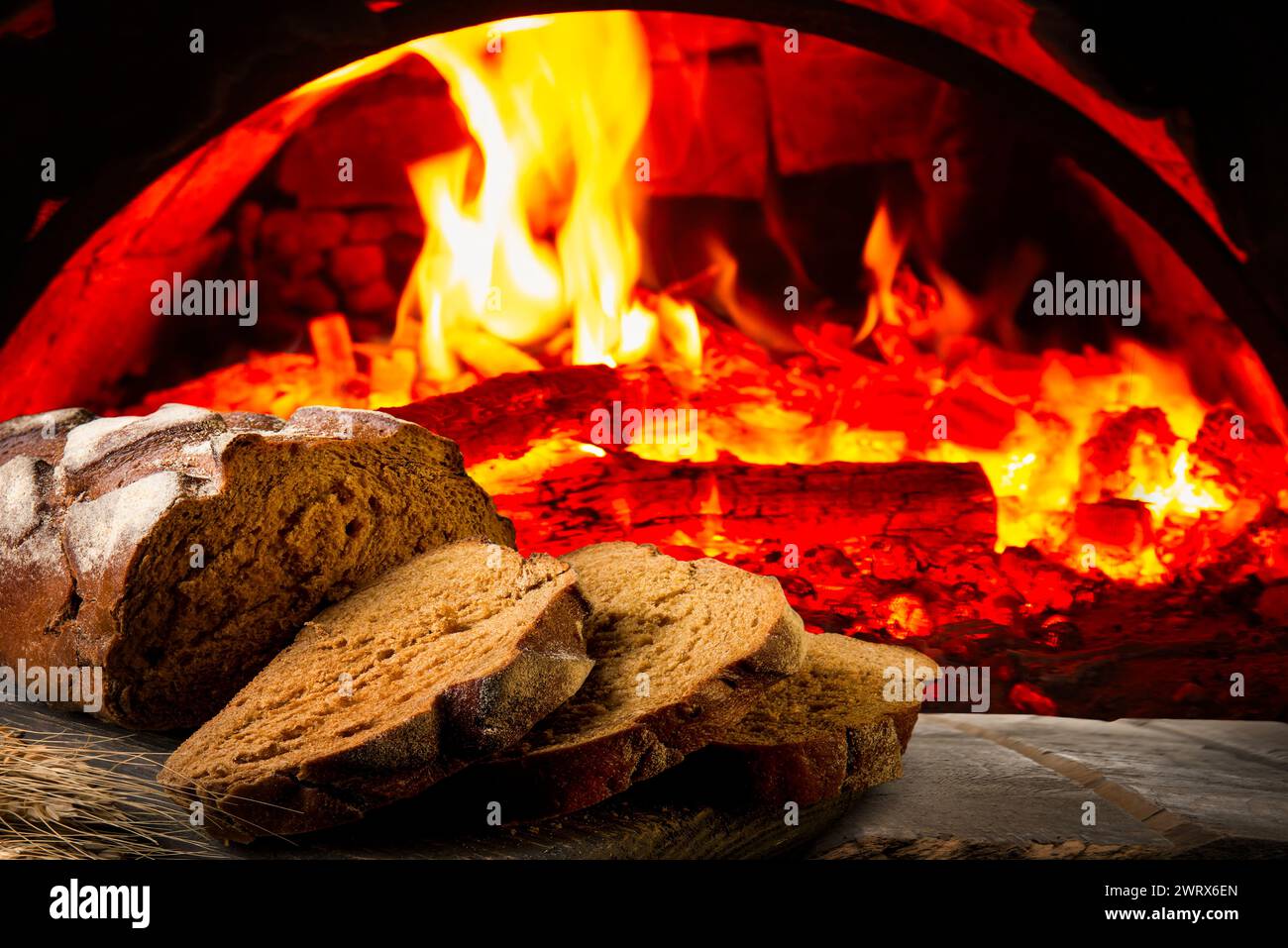 Fresh cooking bread flame bake hi-res stock photography and images - Alamy