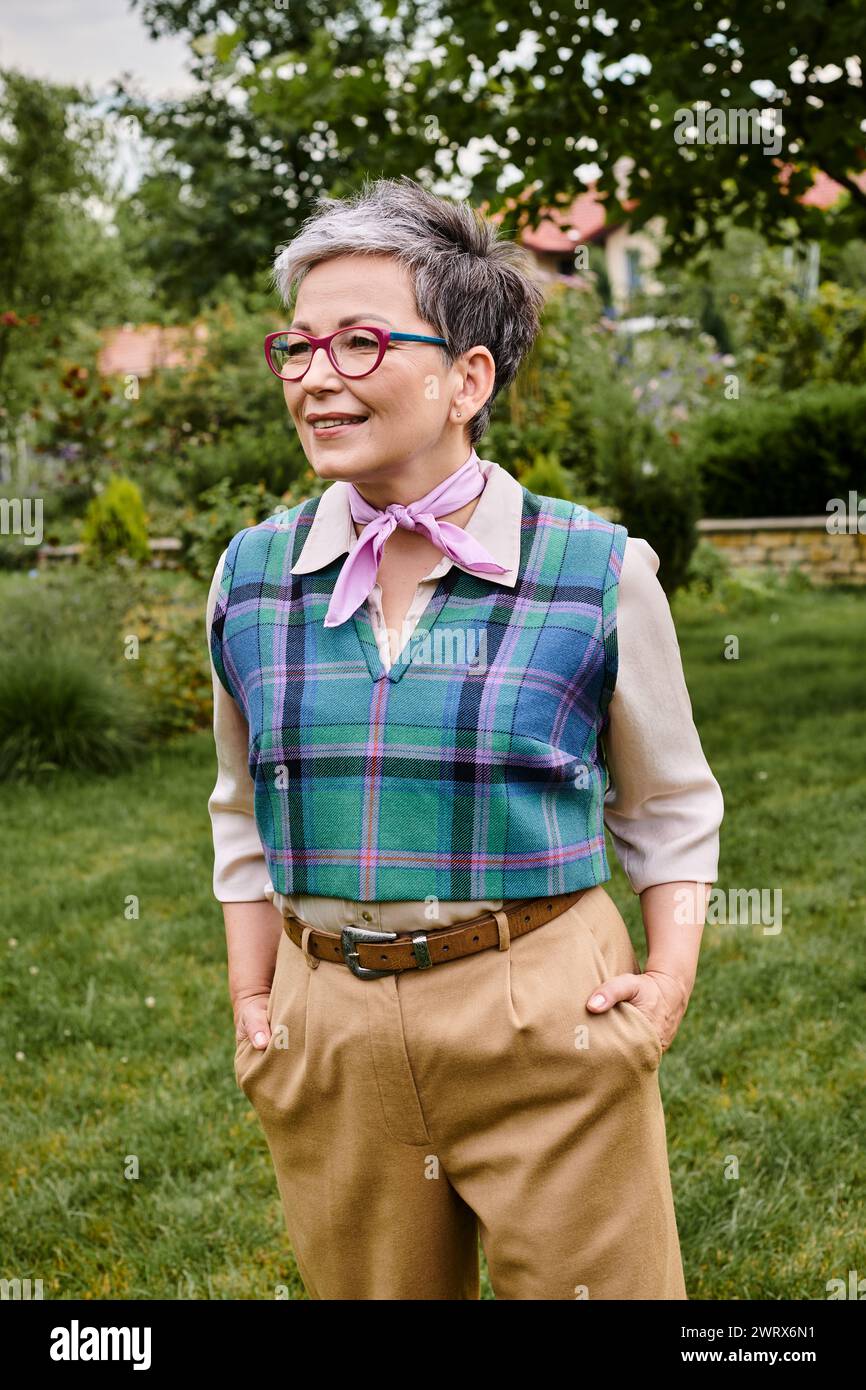 elegant jolly mature woman in sophisticated attire posing near her ...