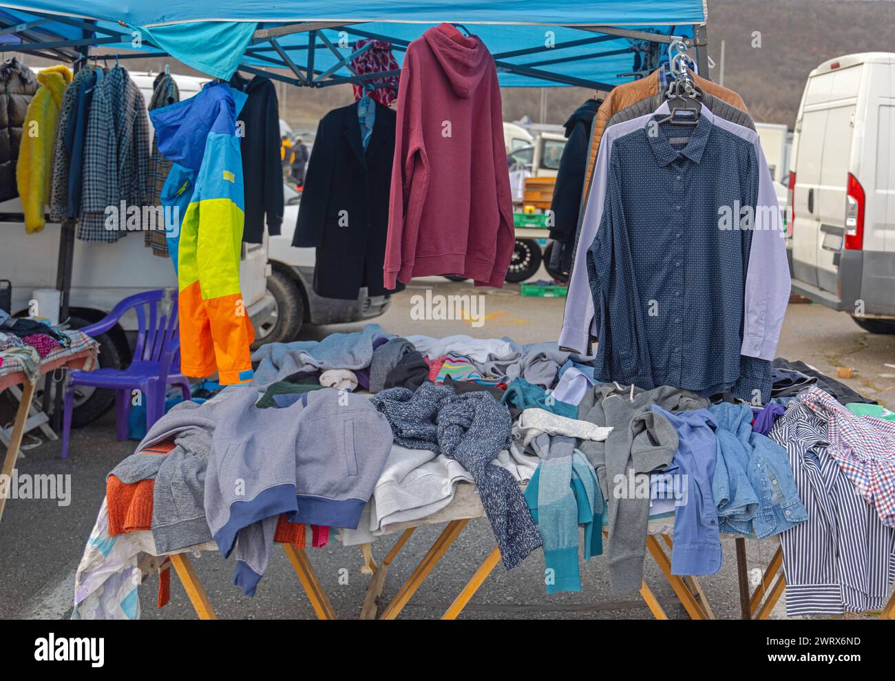 Old clothes flea market hanging hi-res stock photography and images - Alamy