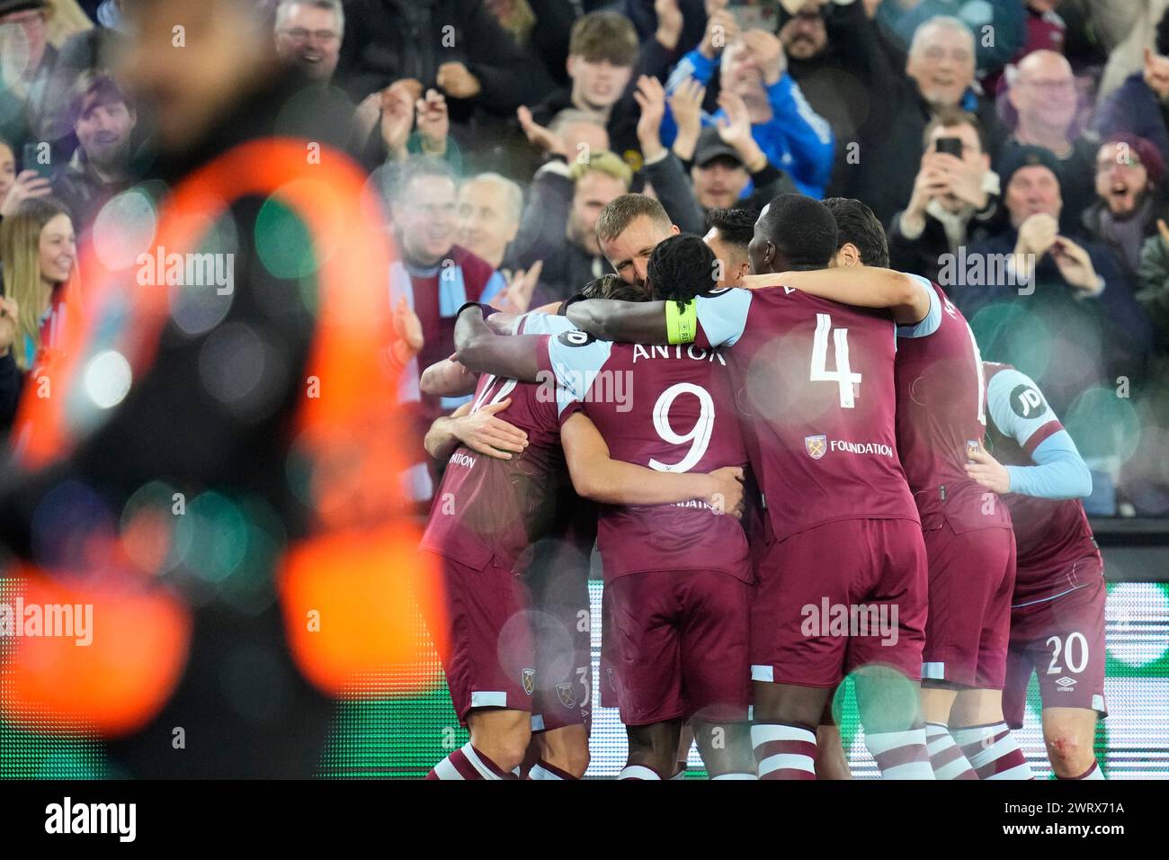 West Ham players celebrate after West Ham's Aaron Cresswell scored his side's third goal during ...