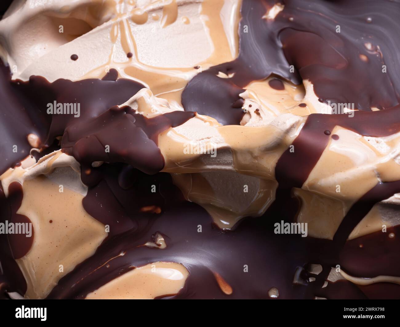 Frozen Toffifee flavour gelato - full frame detail. Close up of beige ...