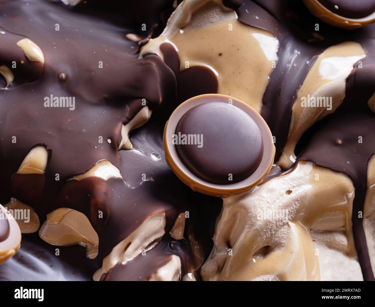 Frozen Toffifee flavour gelato - full frame detail. Close up of beige ...