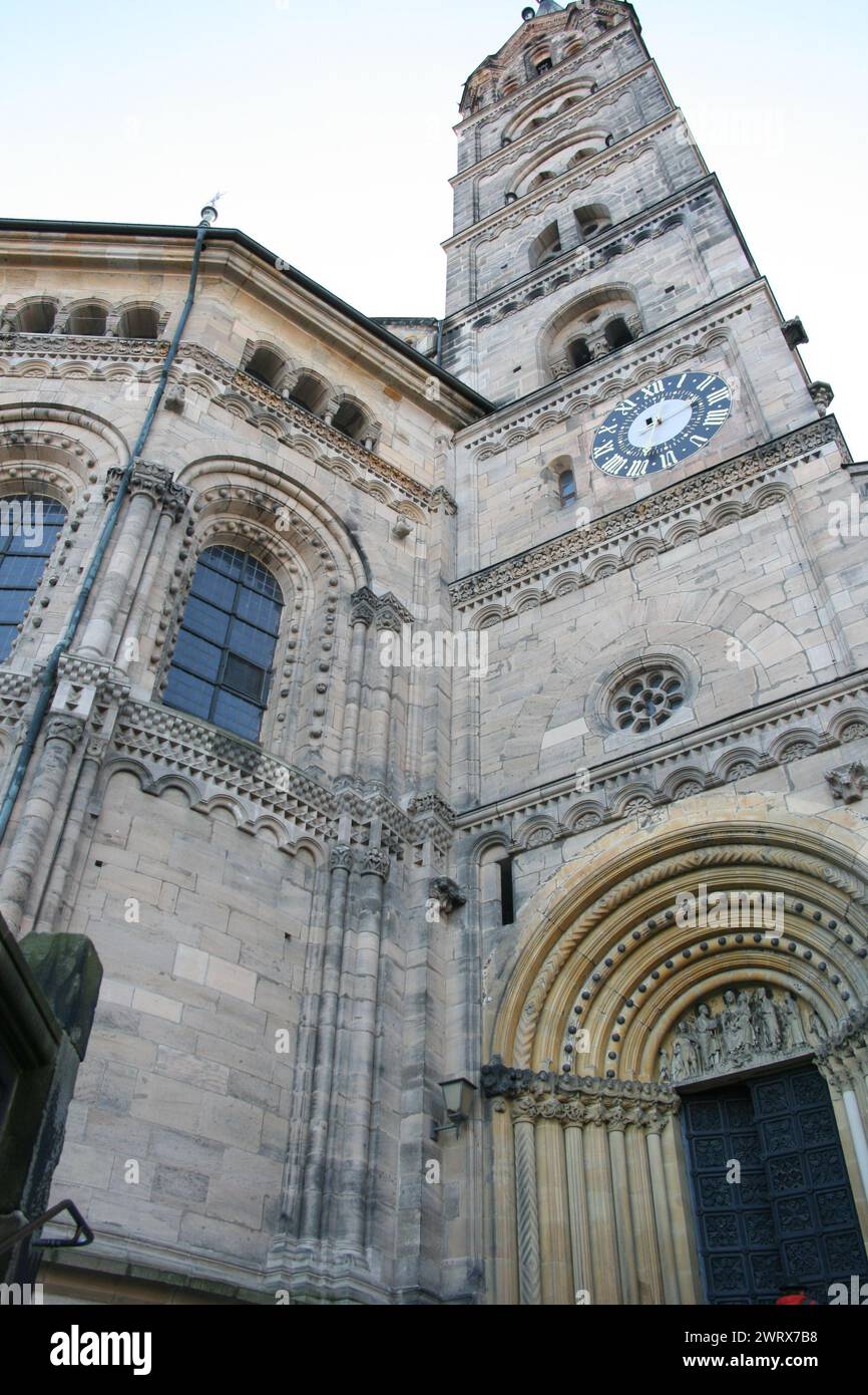 Stone building with clock tower and smaller clock in corner Stock Photo ...