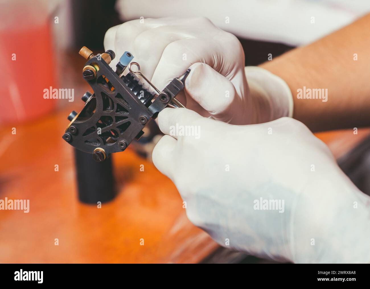 Man tattoo master in salon hi-res stock photography and images - Alamy