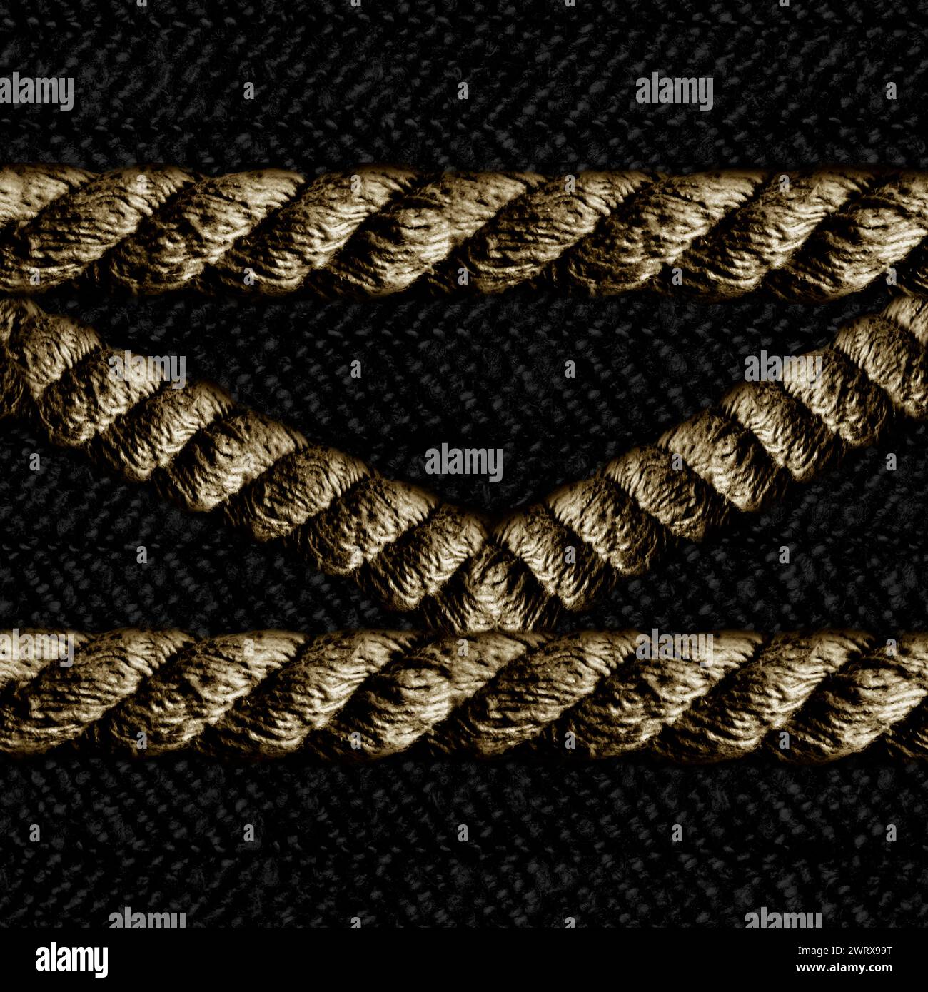 Seamless texture photo of golden colored ropes pattern on black cloth ...