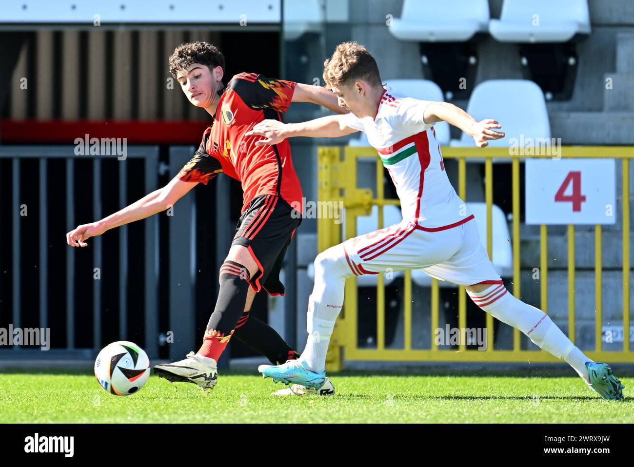 Tubize, Belgium. 14th Mar, 2024. Youssef Hamdaoui (21) of Belgium pictured in a duel with Erik ...