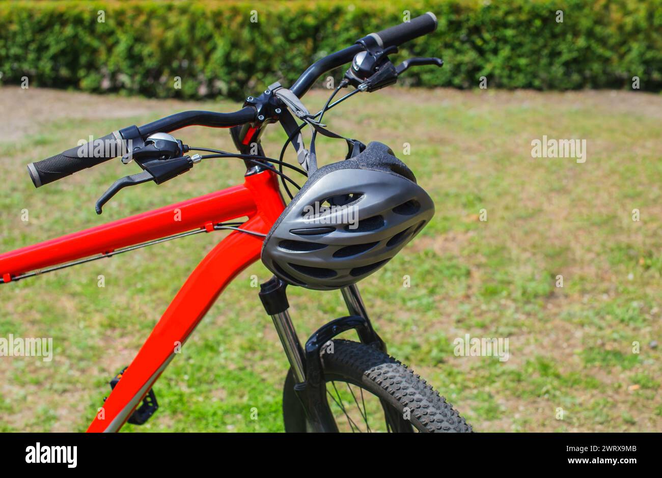The front part of the bicycle is red-wheel, wheel and frame close-up ...