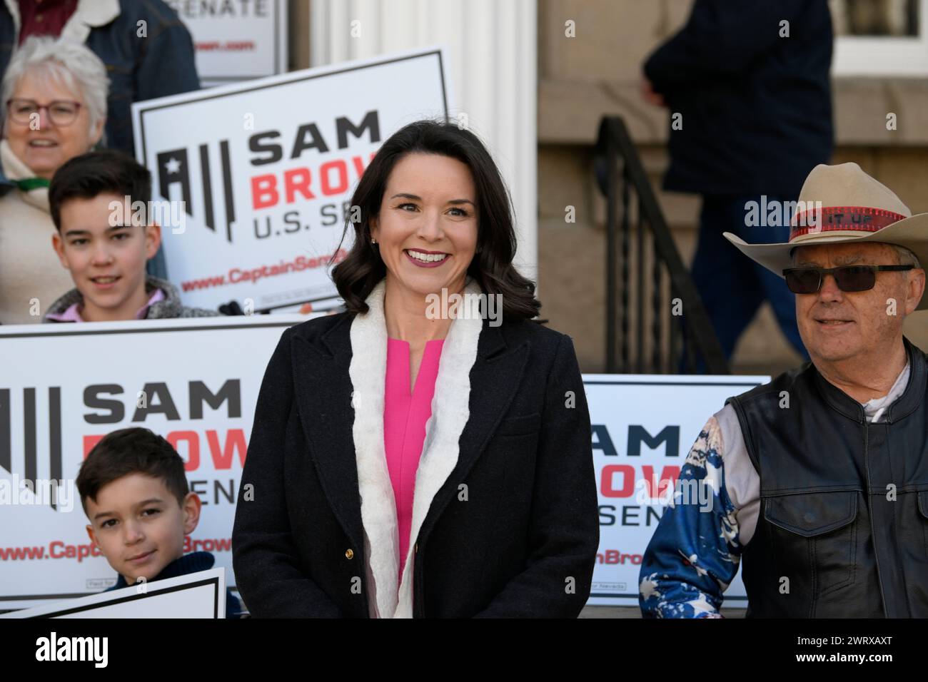 Republican U.S. Senatorial candidate Sam Brown's wife Amy Brown listens ...