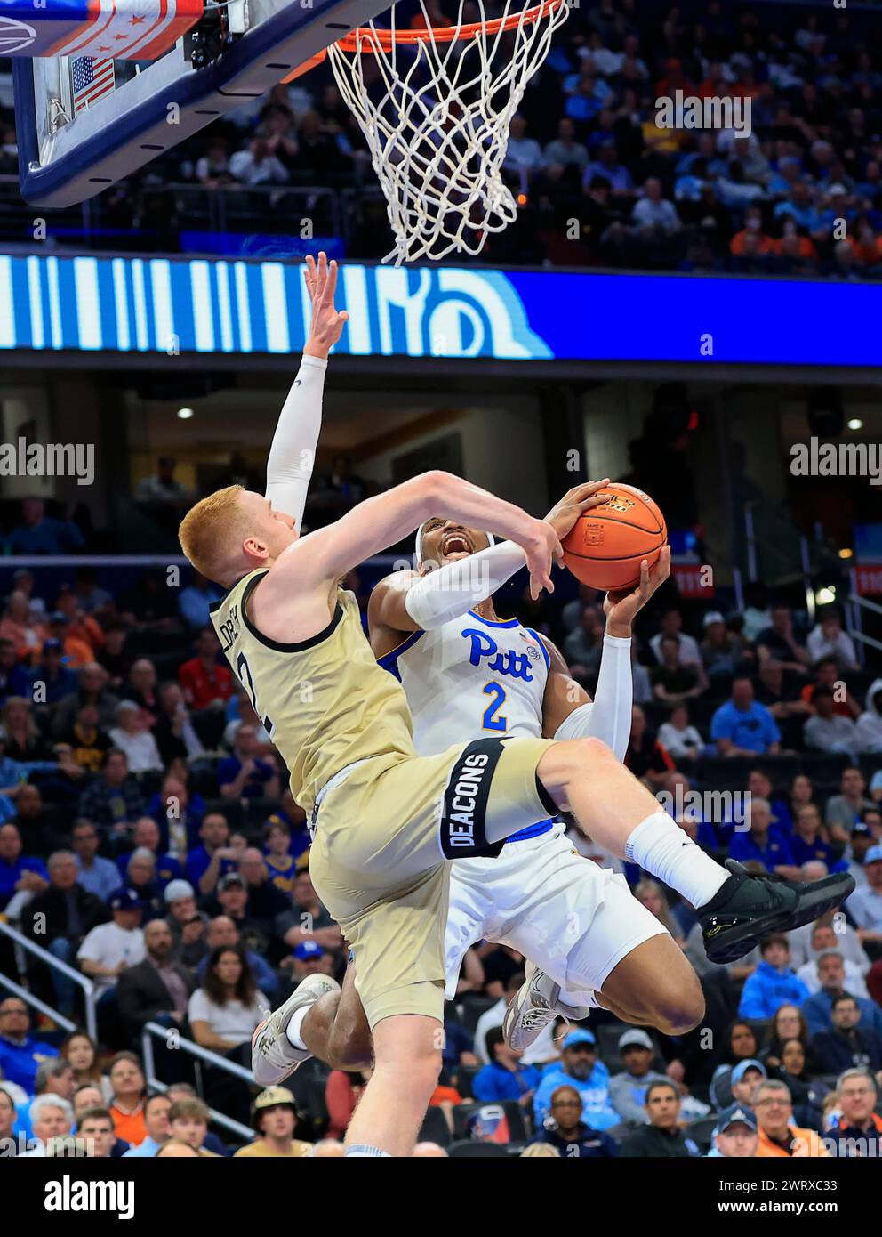 March 14, 2024: Pitt Panthers Forward (2) Blake Hinson is fouled by ...