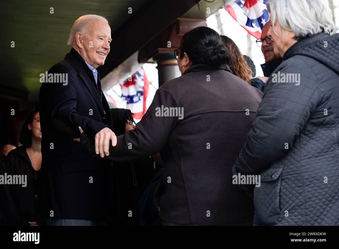 President Joe Biden talks with supporters during a campaign event in ...