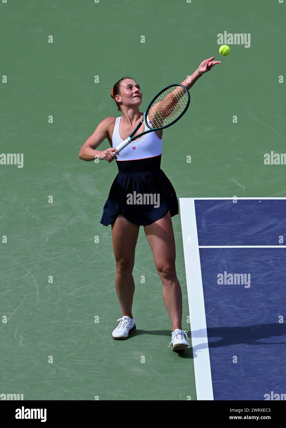INDIAN WELLS, CA - MARCH 14: Marta Kostyuk (UKR) serving during a WTA ...
