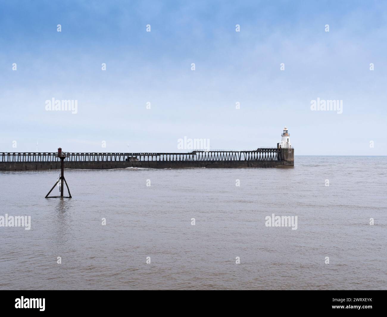 Blyth East Pier Lighthouse with copy space, built 1907 to guide ships ...