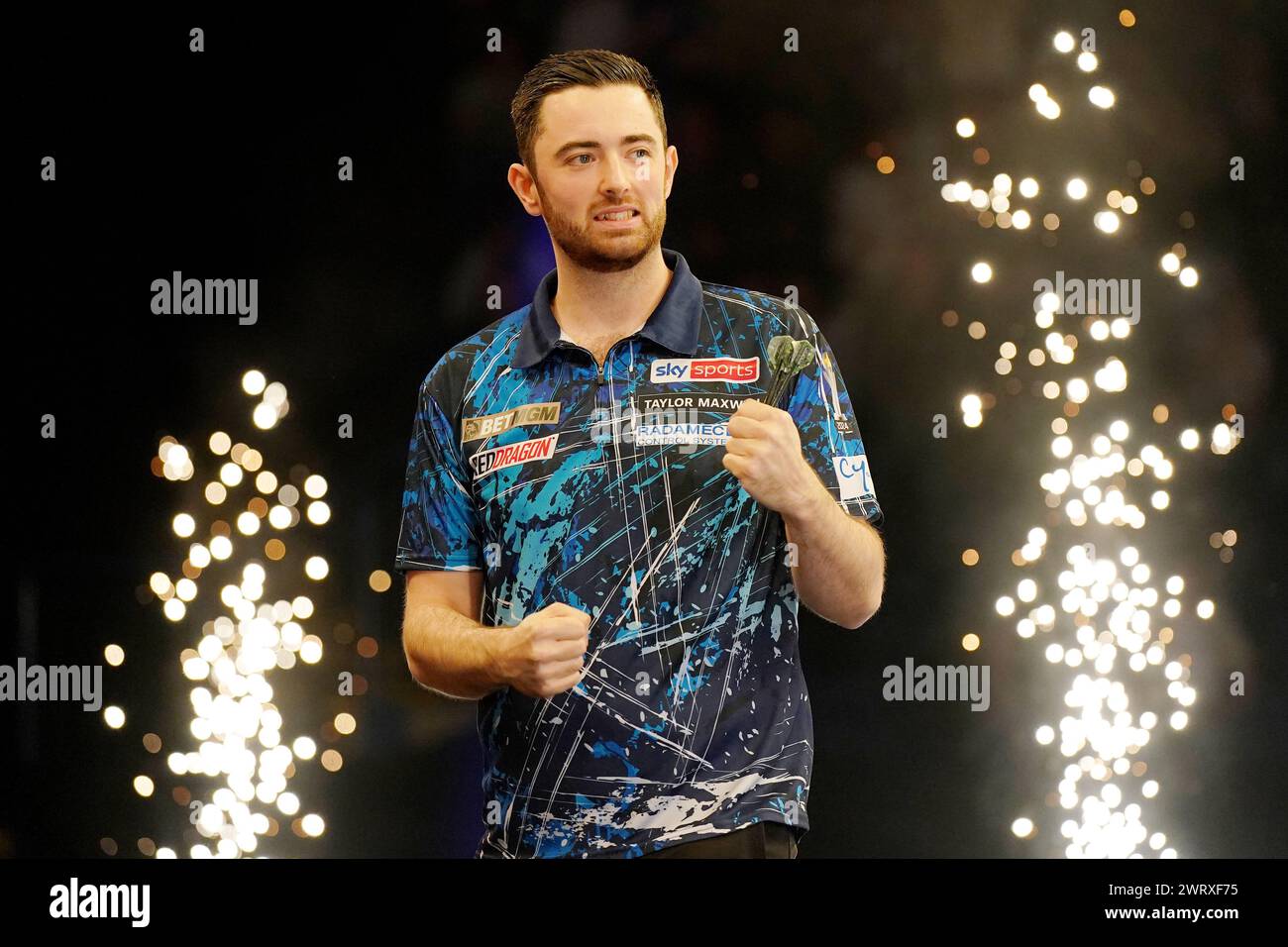 Luke Humphries celebrates victory over Michael Smith (not pictured) on ...