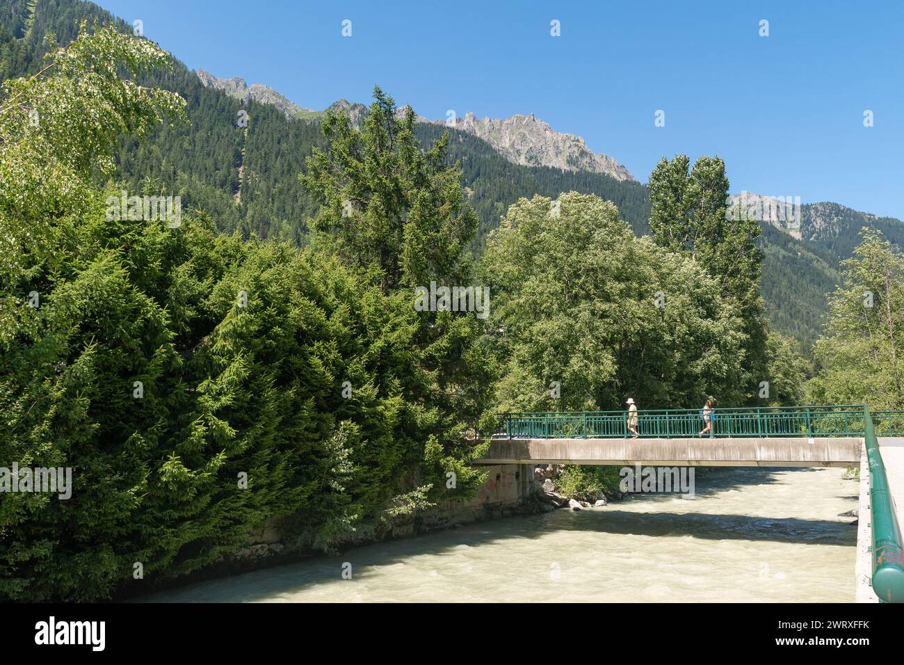 Modern bridge on the Arve River, an alpine river that rises from the ...